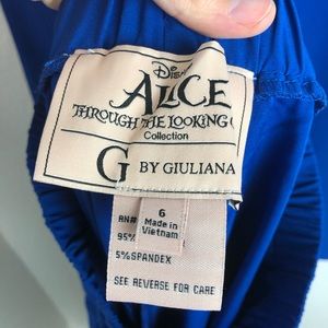 Disney | Pants & Jumpsuits | Disney Alice In Wonderland Blue Skinny ...